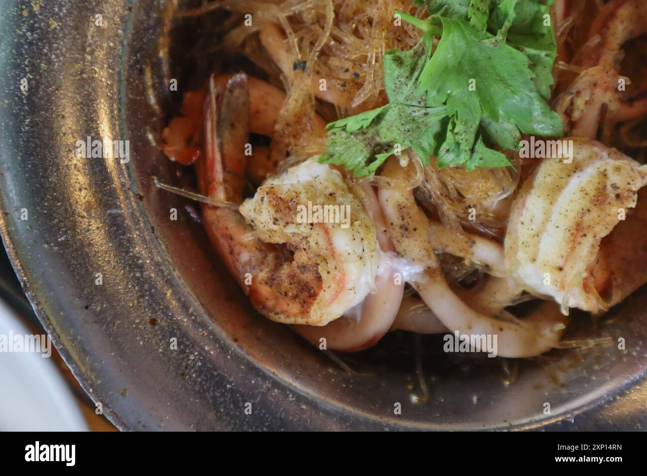 Baked river prawns with vermicelli in a pot is a very popular dish in ...
