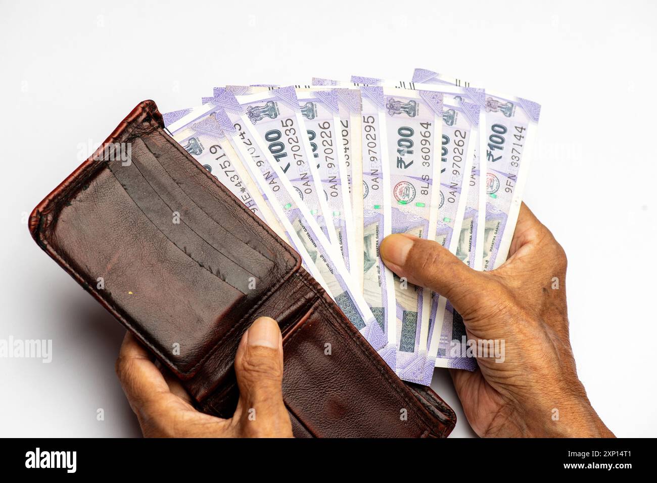 Close-up of Counting Indian rupee isolated on white background Stock ...