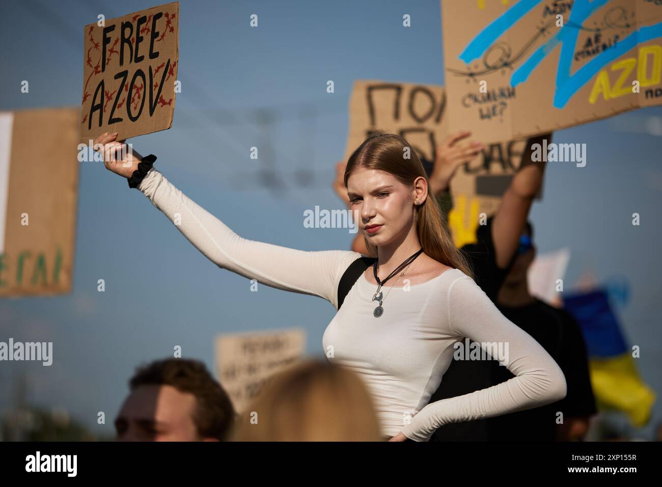 Ukrainian girl holds a banner Free Azov on a public protests against ...