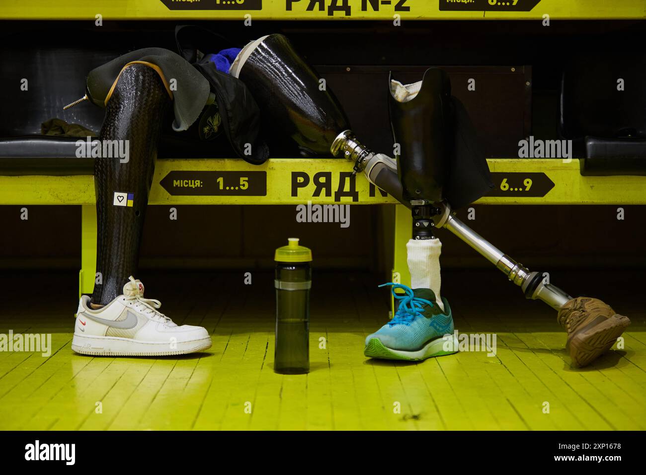 Detached prosthetic legs at sport arena. Lower extremity prosthesis for ...
