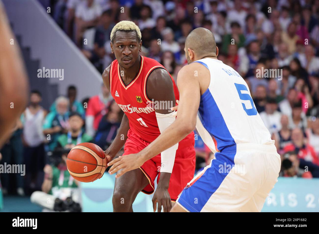 Isaac Bonga of Germany and Nicolas Batum of France, Basketball, Men's ...