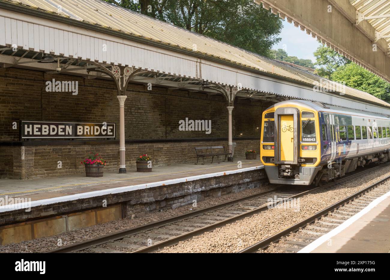 A Northern Rail train standing in Hebden Bridge station, Yorkshire ...