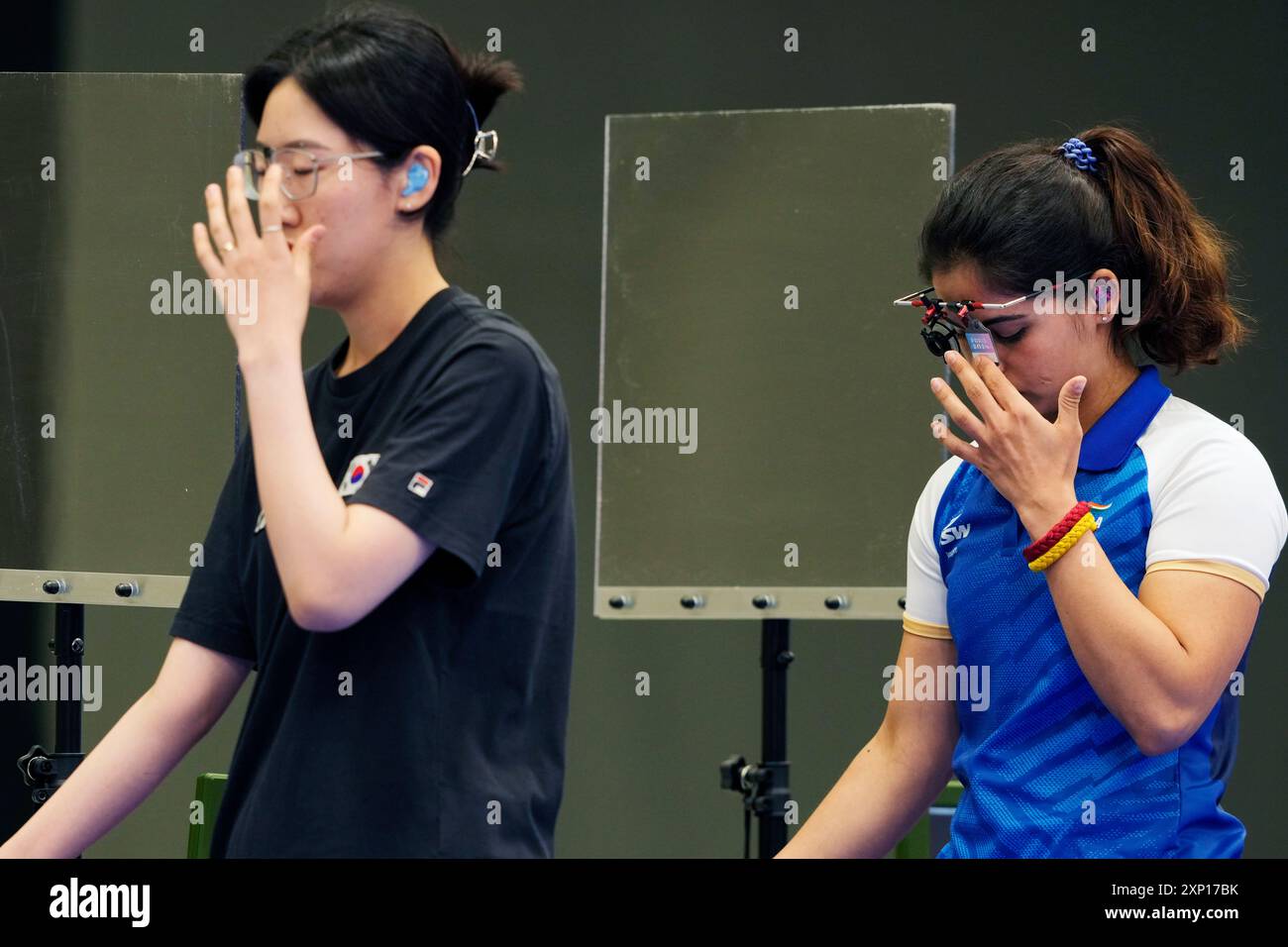 South Korea's Yang Jiin, left, and India's Manu Bhaker compete in the 25m pistol women's final ...