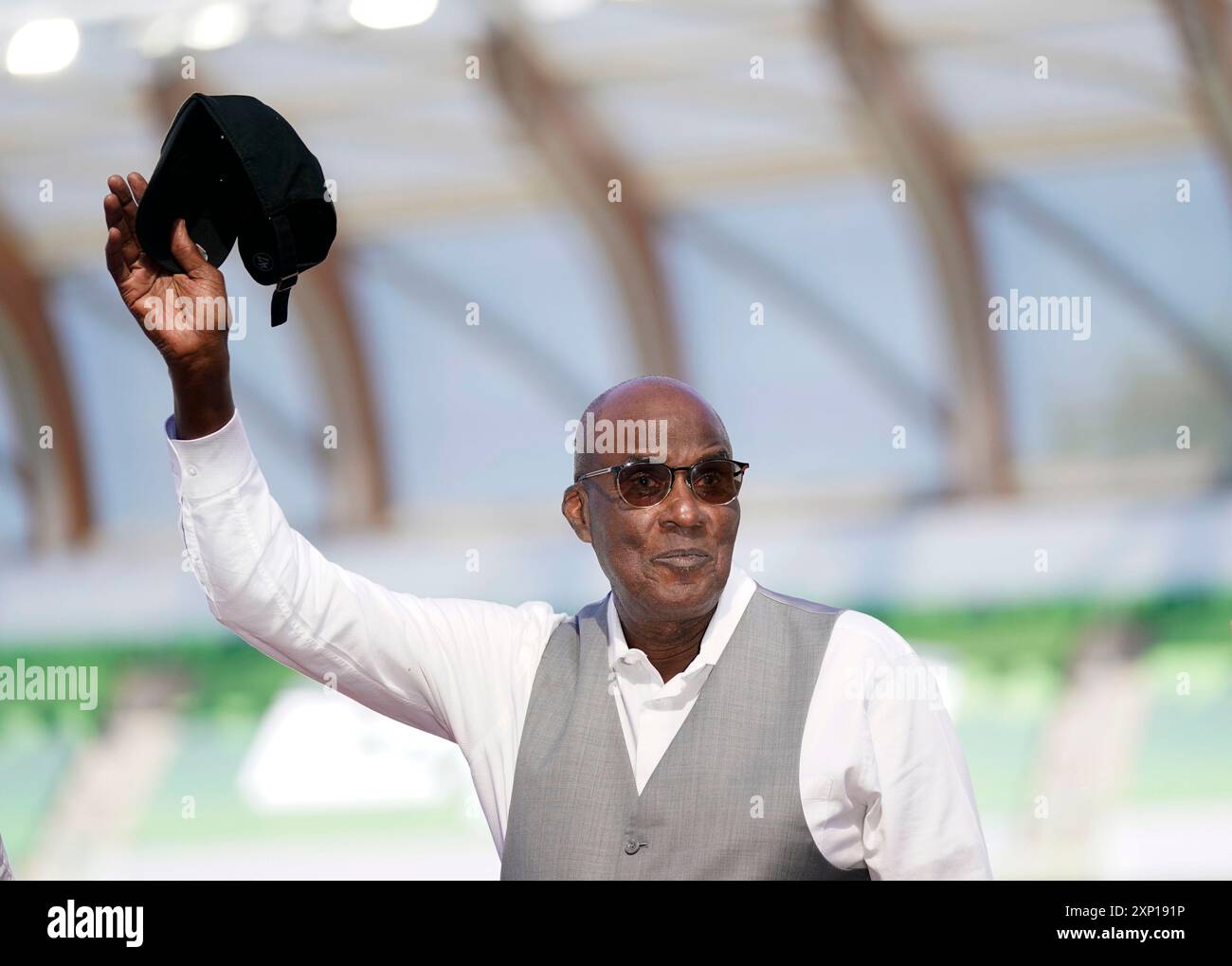 FILE - Bobby Kersee holds up his hat as he is honored as the 2023 USATF ...