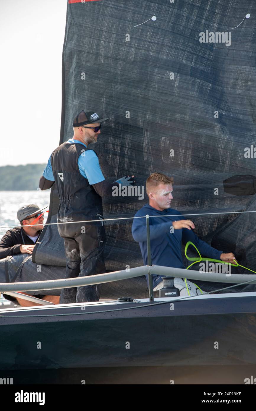 Racing yachts and yachtsmen at the annual cowes week sailing regatta at ...