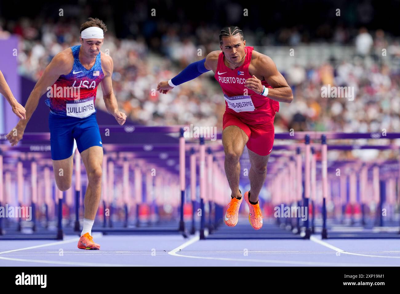 Ayden Owens-Delerme, of Puerto Rico, competes during a heat in the men ...