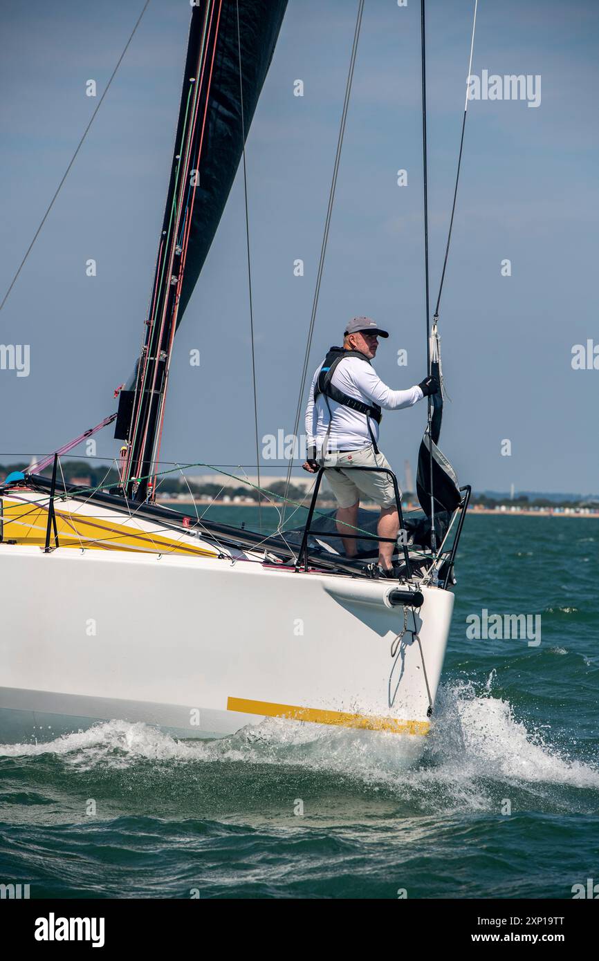 Racing yachts and yachtsmen at the annual cowes week sailing regatta at ...