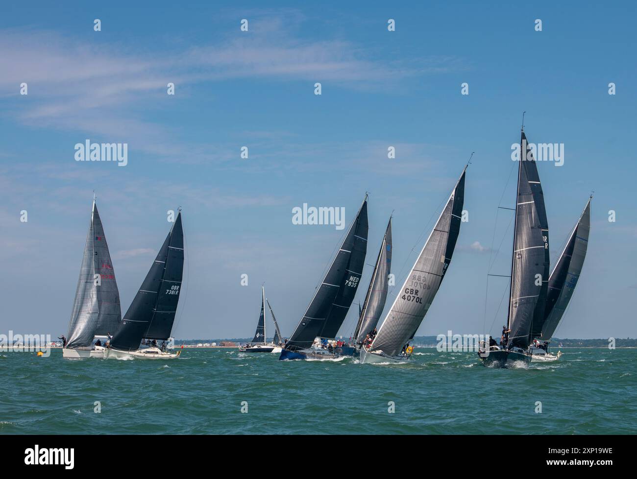 Racing yachts and yachtsmen at the annual cowes week sailing regatta at ...