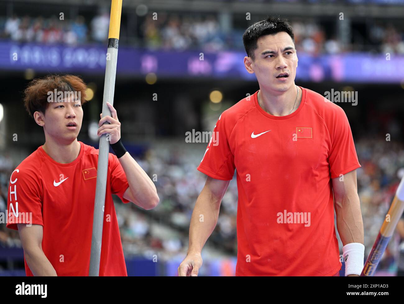 Paris, France. 3rd Aug, 2024. Yao Jie (R) and Zhong Tao of China react ...