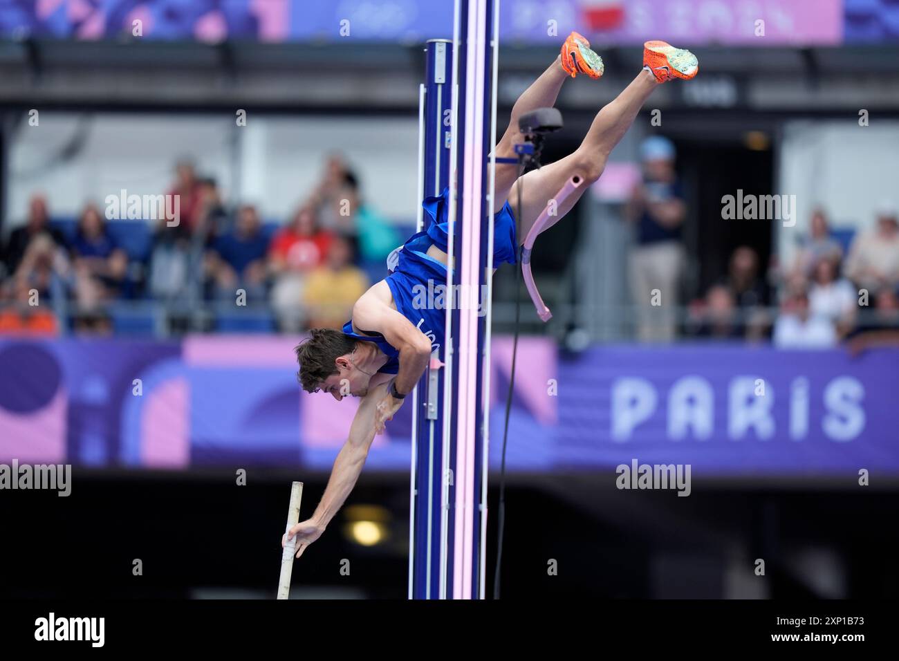 Jacob Wooten, of the United States, competes in the men's pole vault ...