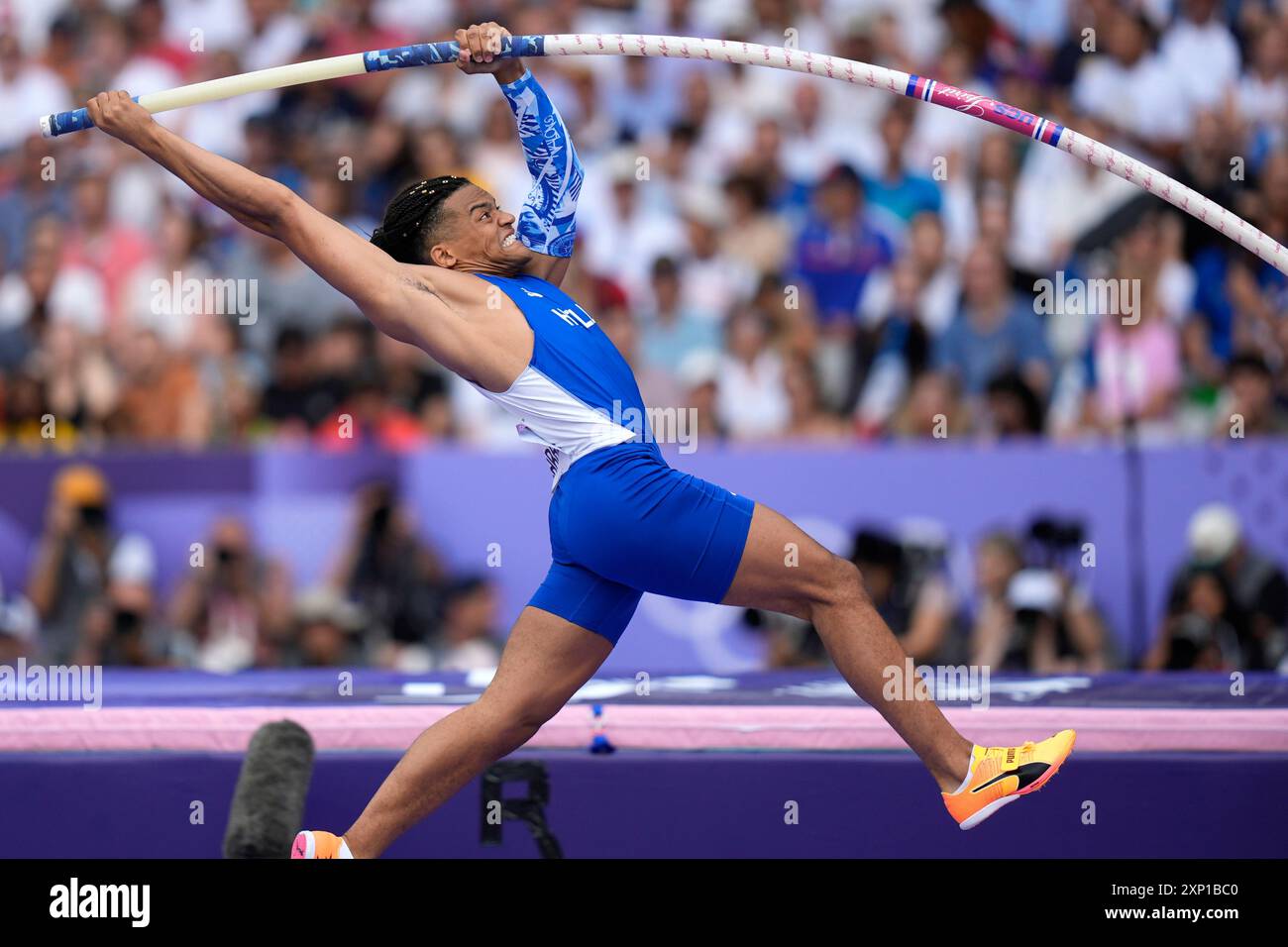 Emmanouil Karalis, of Greece, competes in the men's pole vault ...
