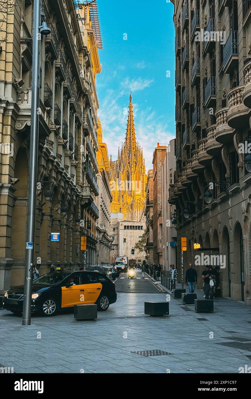 A city street with a yellow taxi cab and a tall building in the ...