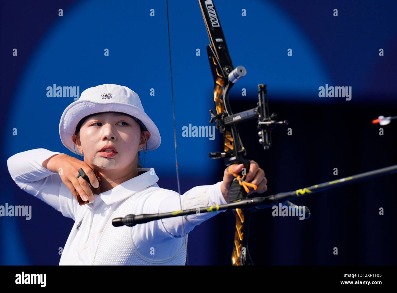 Lim Si-hyeon shoots during the Archery individual quarterfinal against ...