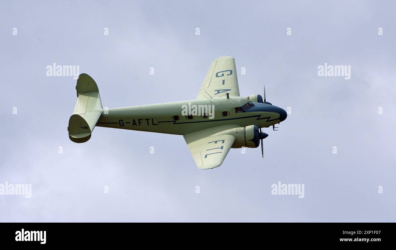 Vintage Lockheed 12A Electra Junior in flight Stock Photo - Alamy