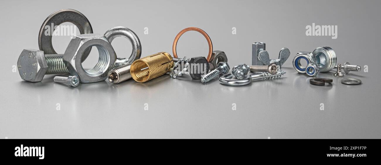 Different types of metal bolts, nuts, screws, hooks and washers ...