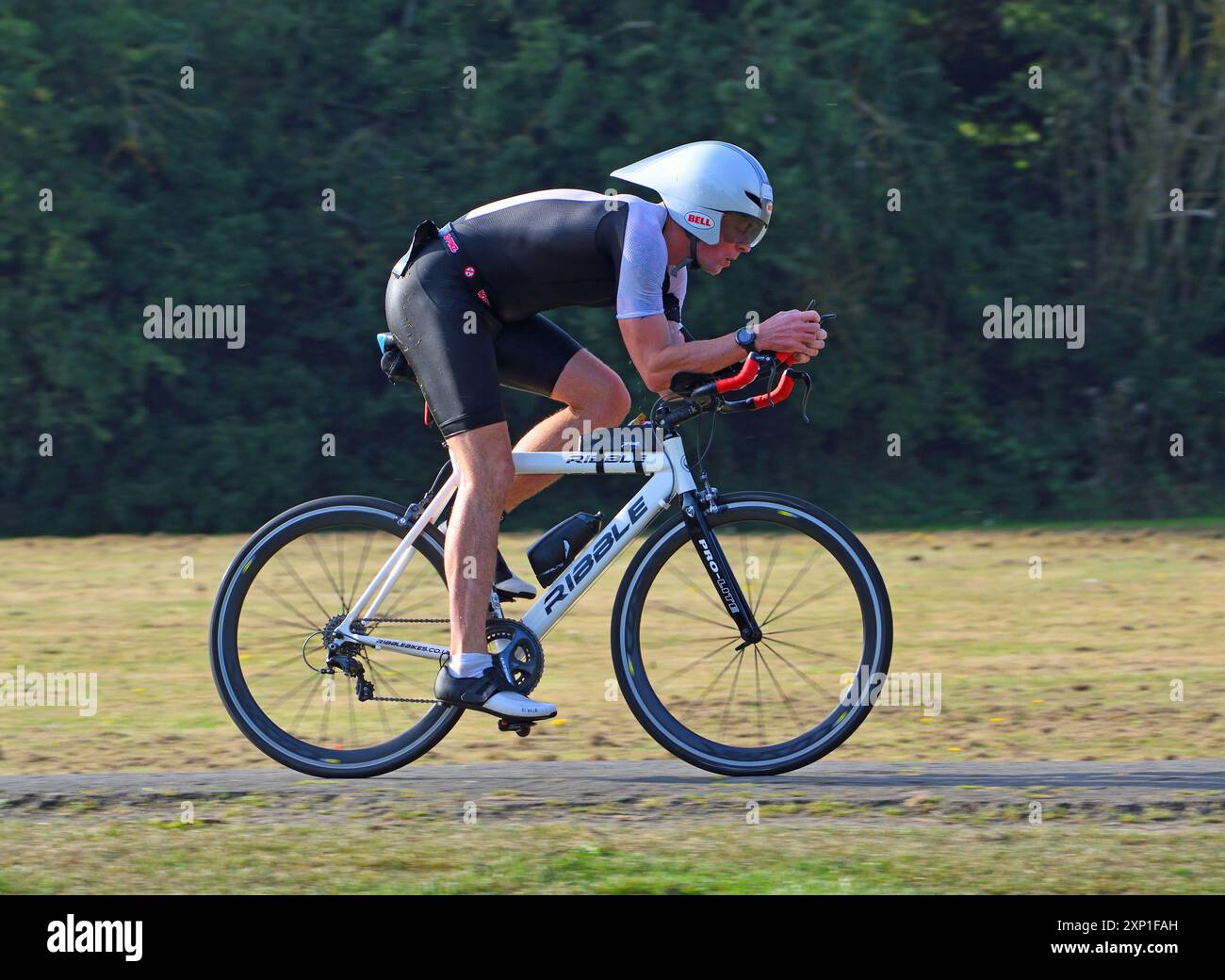 Male competitor in cycling stage of race Stock Photo - Alamy