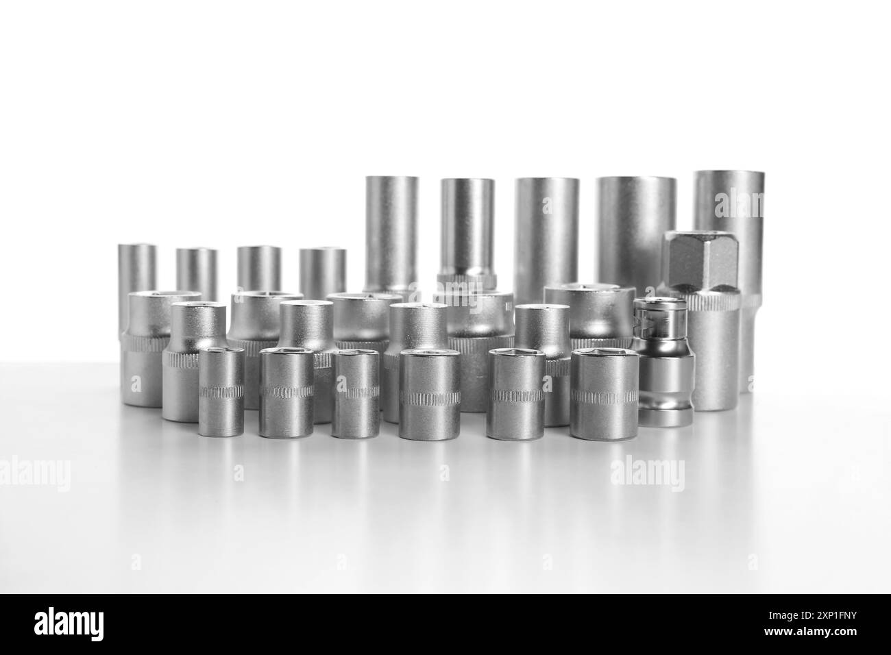 Set of different sockets on white background. Auto mechanic's tools ...