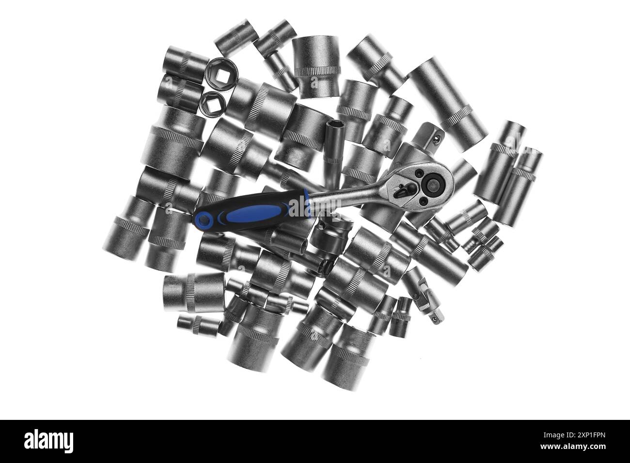 Pile of spark plug sockets and torque wrench on white background, top ...