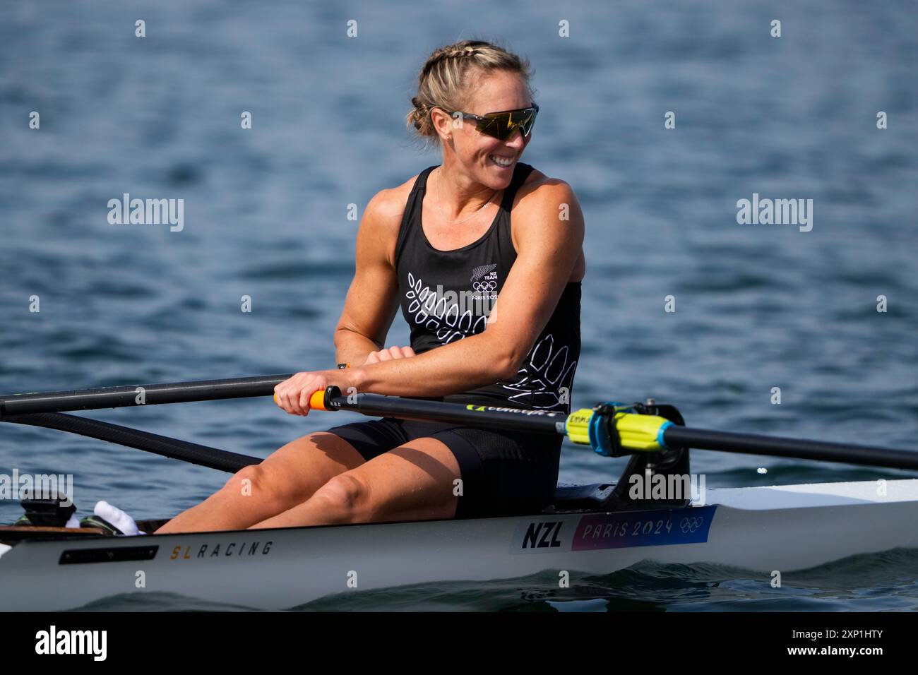 Emma Twigg, of New Zealand, reacts after winning silver in the women's ...