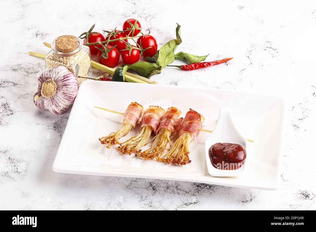 Tasty Grilled enoki mushroom with bacon Stock Photo - Alamy
