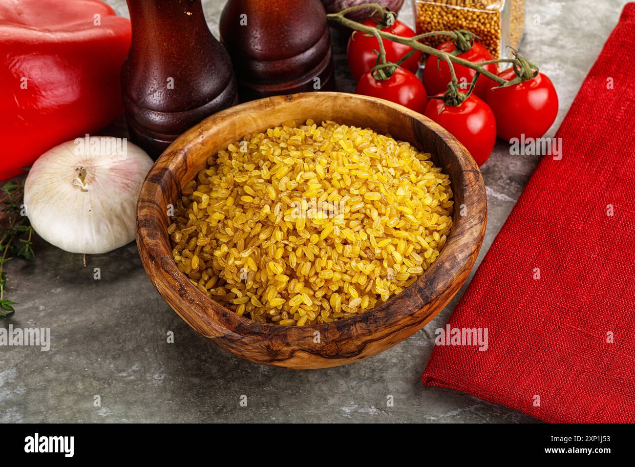 Dry wheat bulgur cereal heap for cooking Stock Photo - Alamy