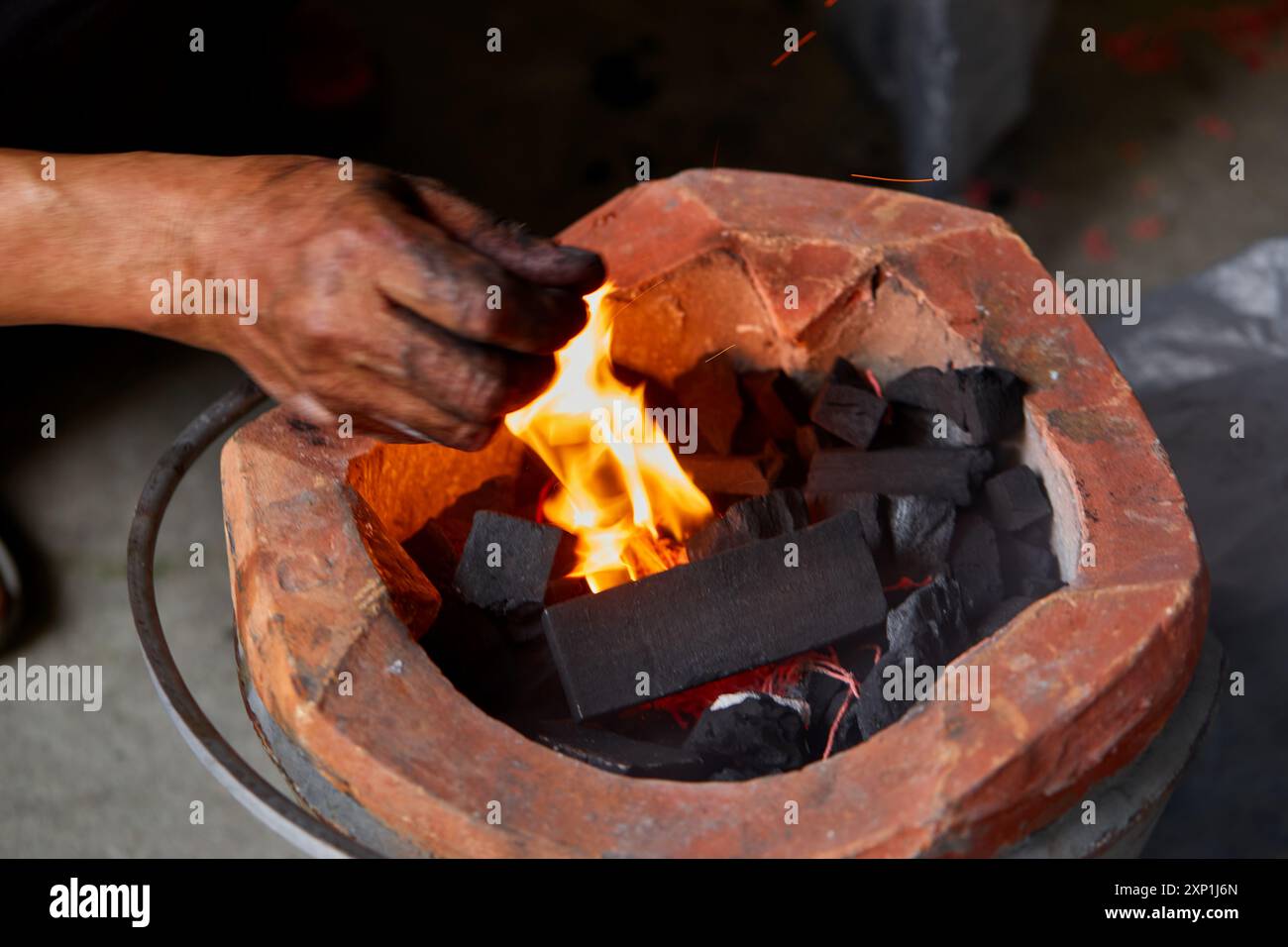 Close-up view of bonfire in charcoal stove Stock Photo - Alamy