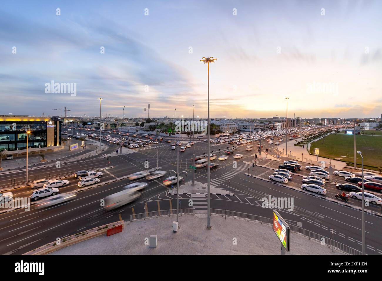 Holiday villa signal C ring Road. Doha Road and traffic Stock Photo - Alamy
