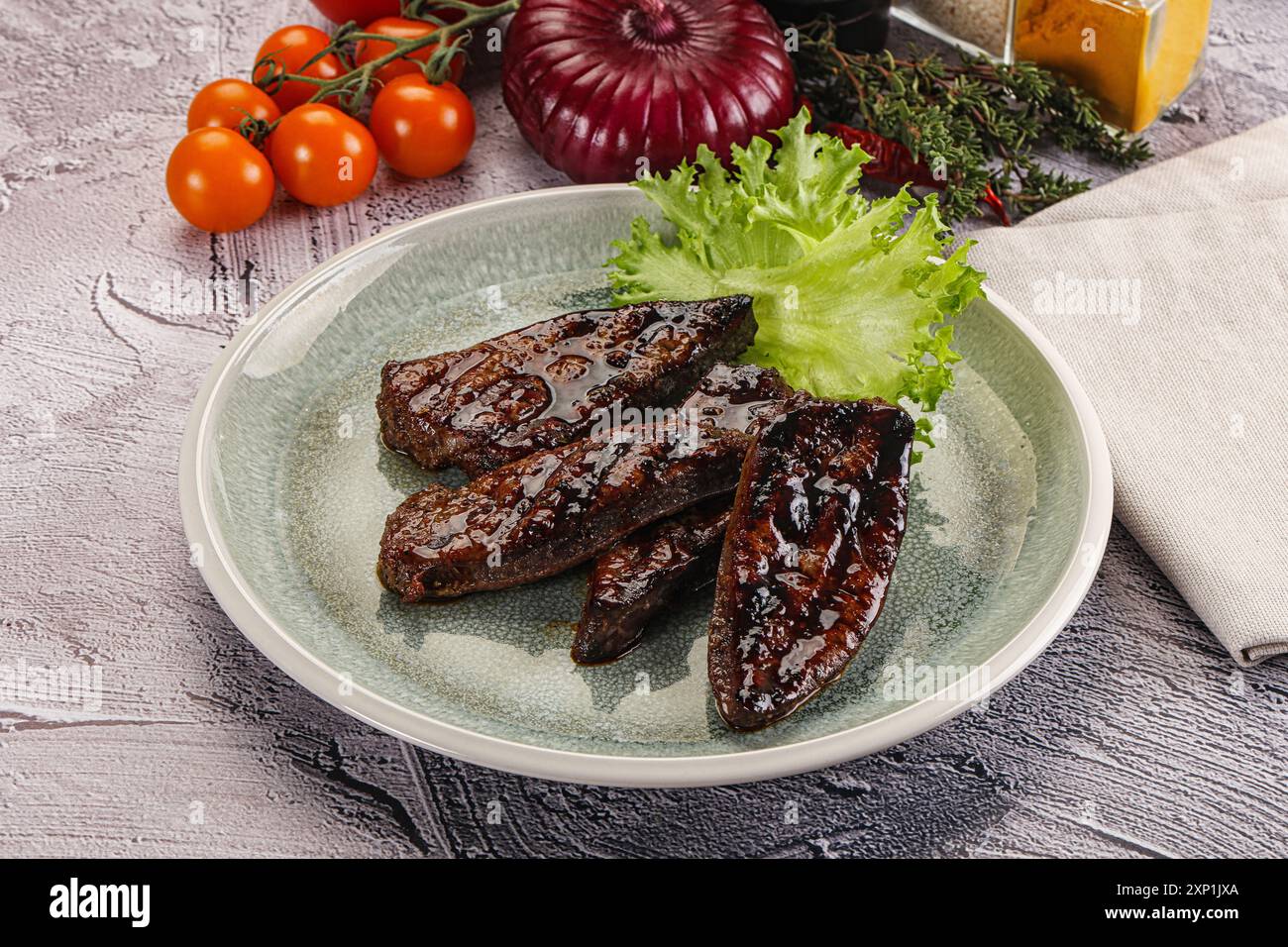 Grilled diet beef liver steak in the plate Stock Photo - Alamy