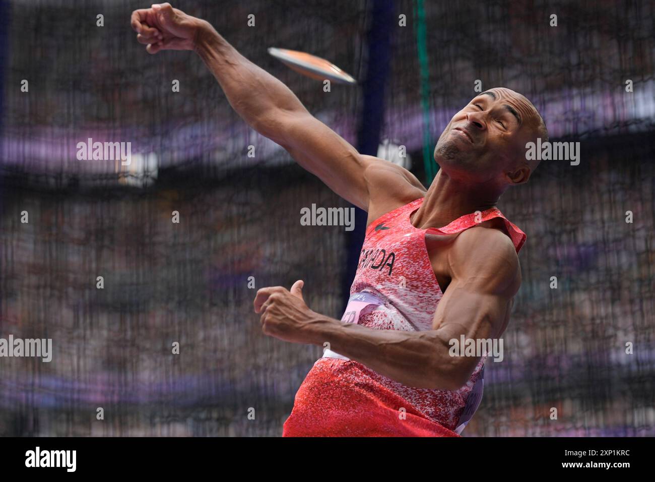 Damian Warner, of Canada, competes in the decathlon discus throw at the ...