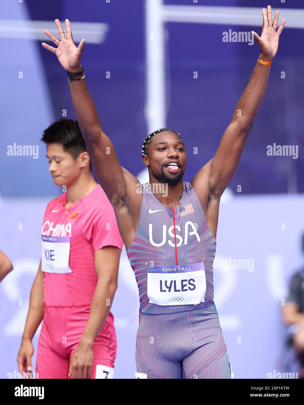 Paris, France. 3rd Aug, 2024. Xie Zhenye of China and Noah Lyles (R) of ...