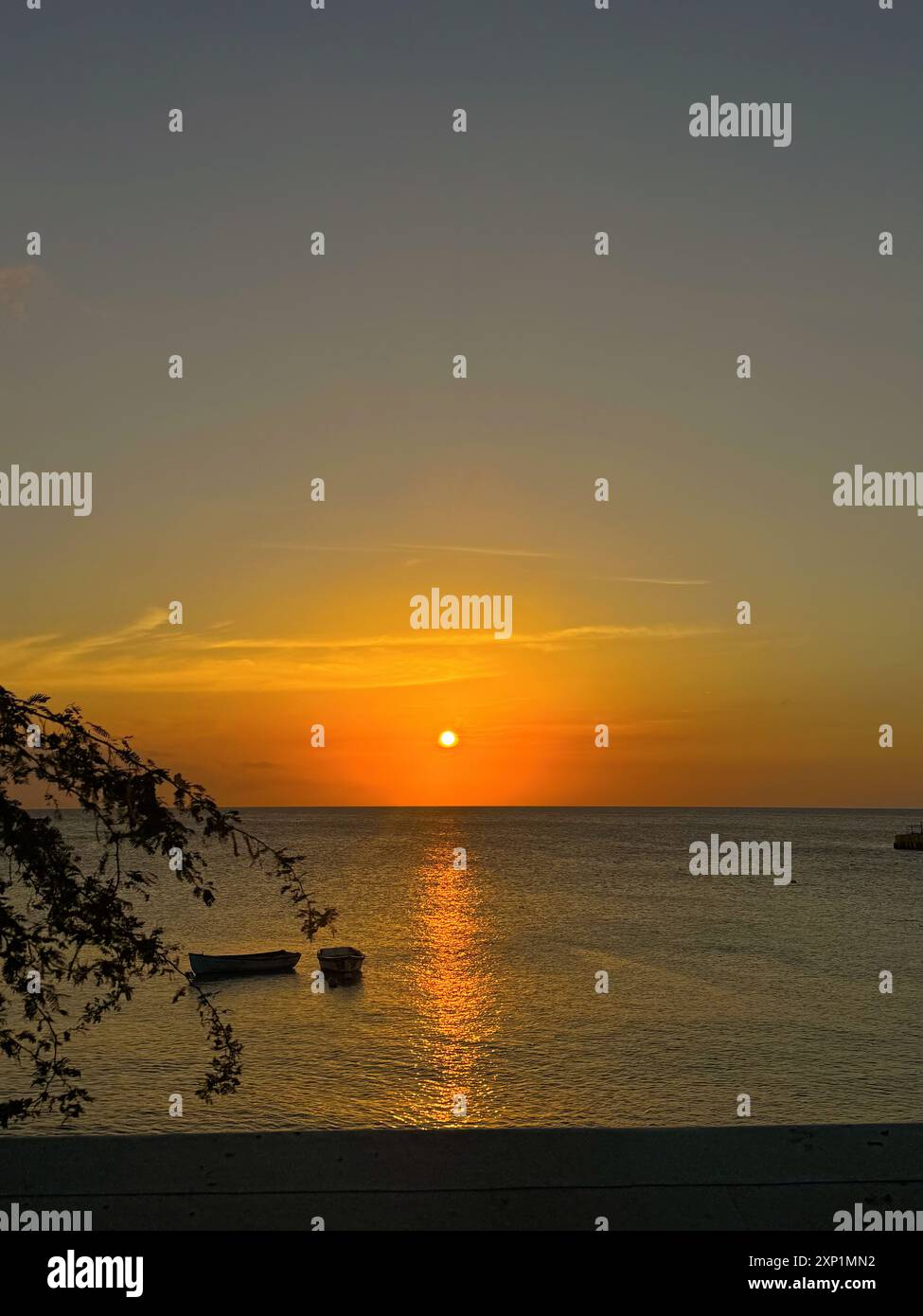 Beach and sea at sunset in Curacao Stock Photo - Alamy