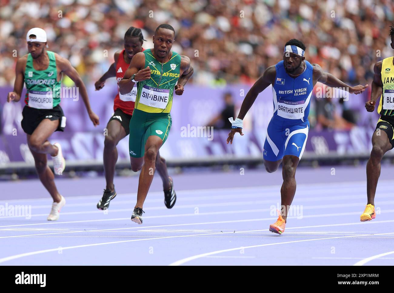 Paris, France. 3rd Aug, 2024. Akani Simbine (C) of South Africa ...