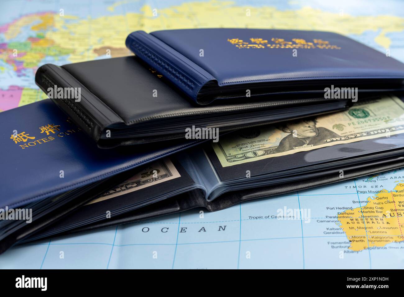 Banknote Collection Album on World Map Stock Photo - Alamy