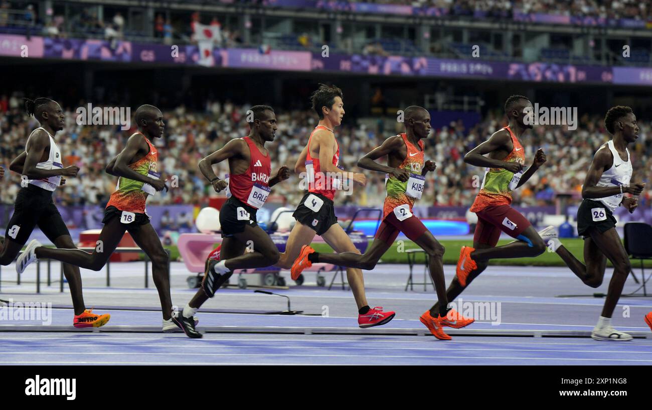 Athletes compete in the men's 10,000 meters at the Paris Olympics on ...