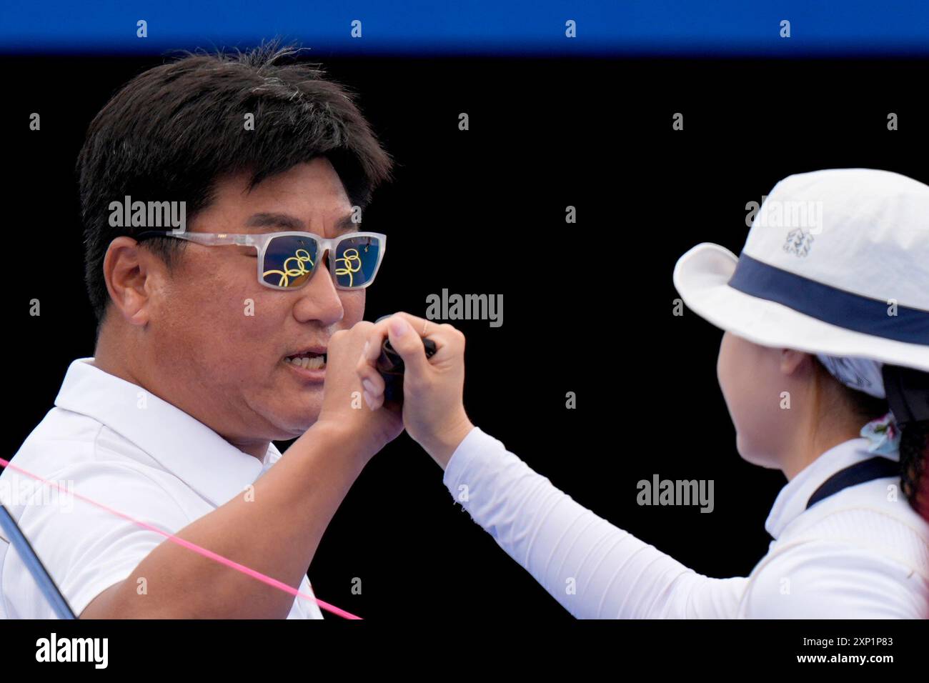 South Korea's Jeon Hun-young, right, celebrates with her coach Yang ...