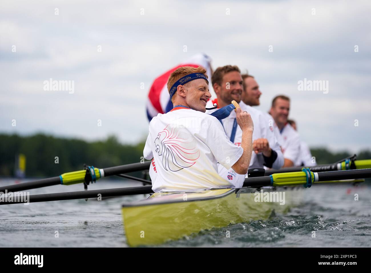 Harry Brightmore, of Britain, celebrates with the gold medal in the men ...