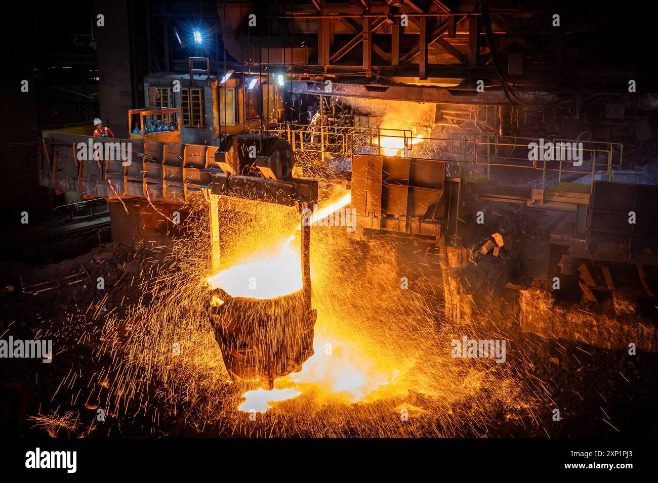 Sorowako, Indonesia. 02nd Aug, 2024. Workers supervise the nickel ore ...