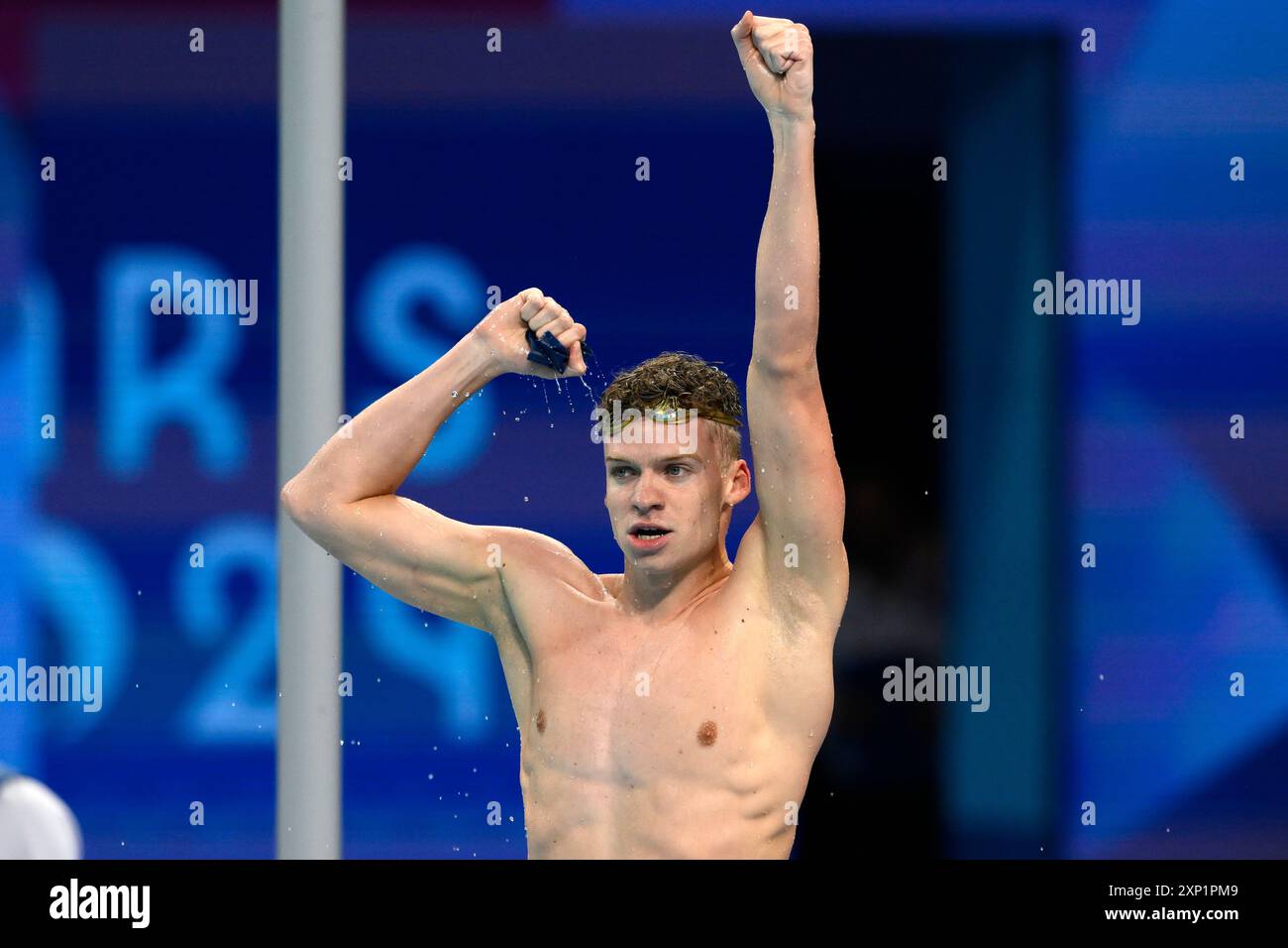 Leon Marchand of France celebrates after competing in the swimming 200m ...