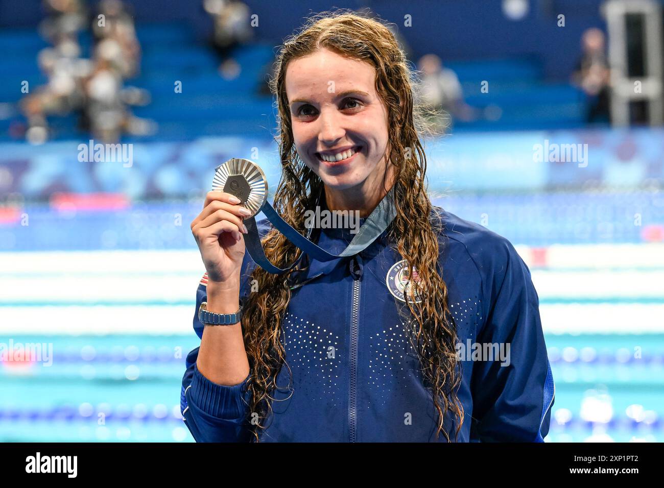 Regan Smith of United States of America shows the medal of the 200m ...