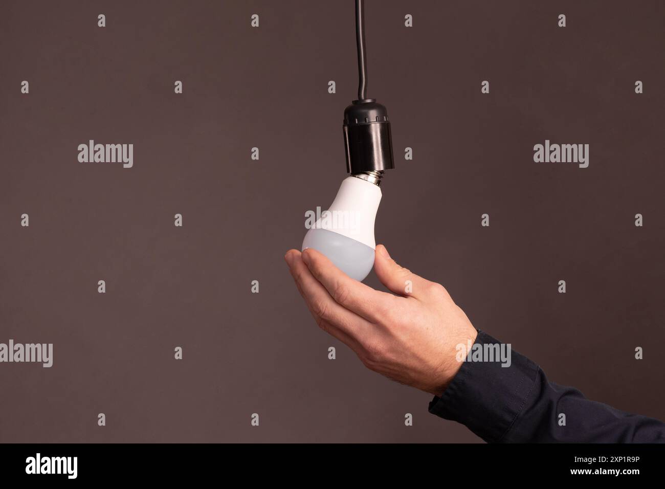 Hold the light bulb in your hands hi-res stock photography and images ...