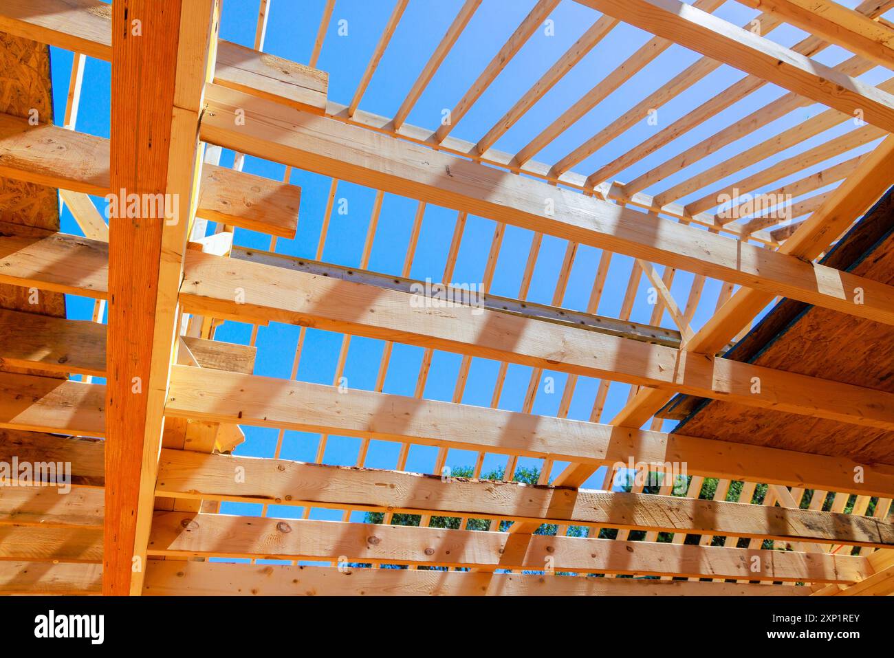Using trusses rafters as frameworks, wooden roof beams can be ...