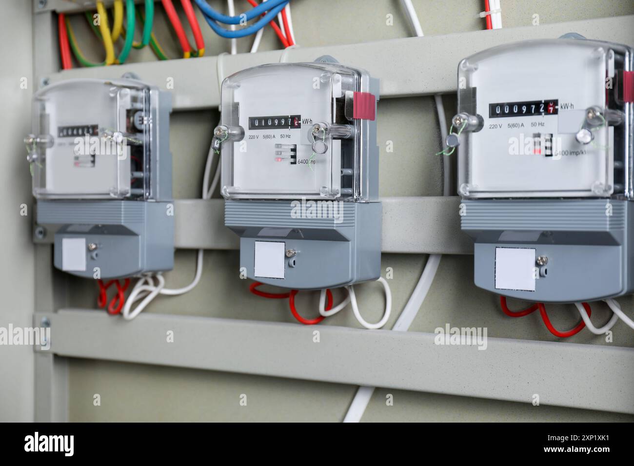 Electric meters and wires in fuse box. Energy measuring device Stock ...