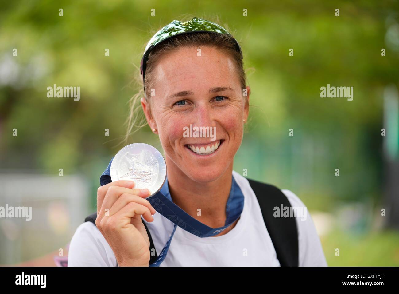 Emma Twigg, of New Zealand, poses with her silver medal in the women's ...