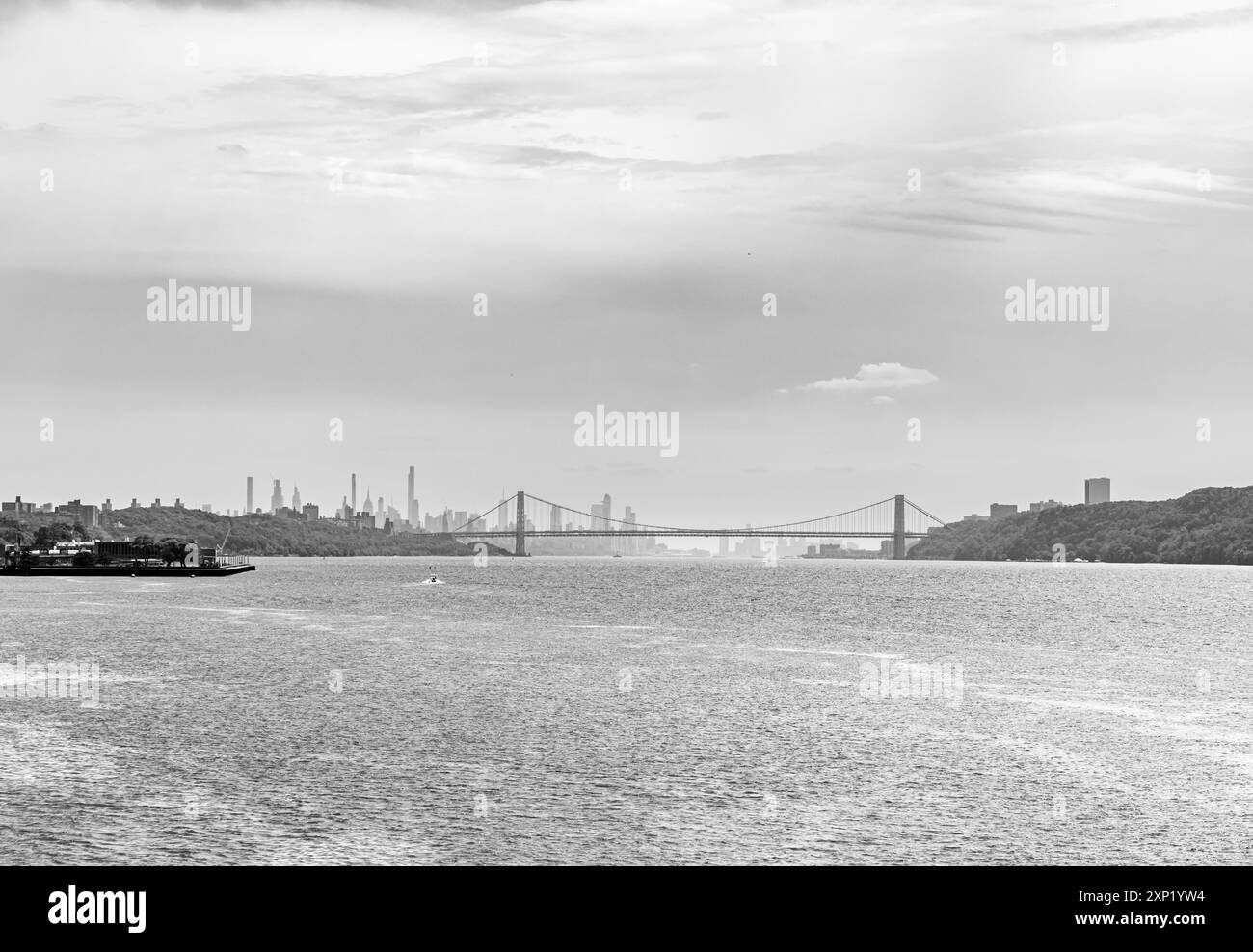 black and white view of a down the hudson river looking towards NYC ...