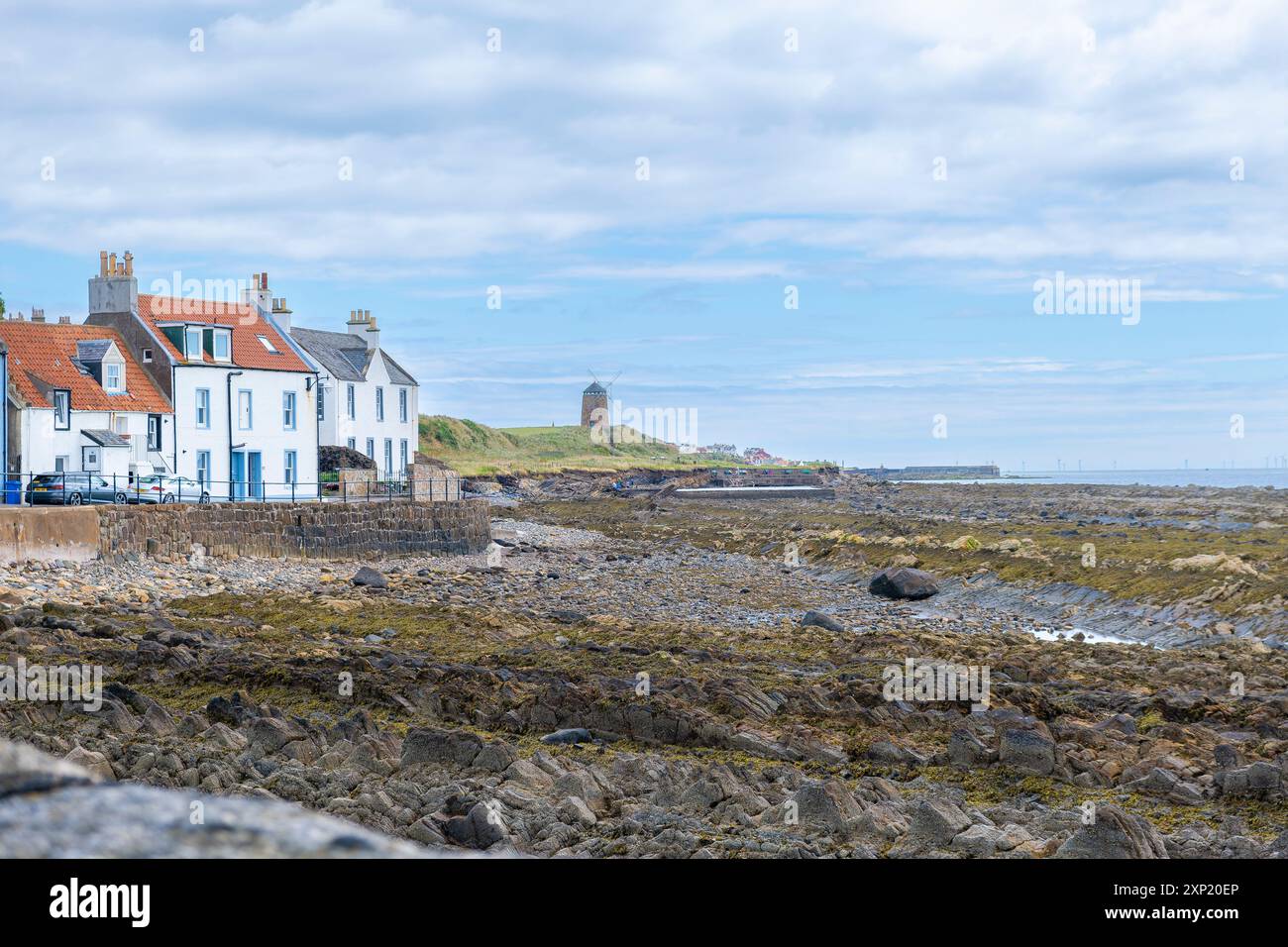 St Monans, Scotland, UK - July 13, 2024: The old and restored windmill ...