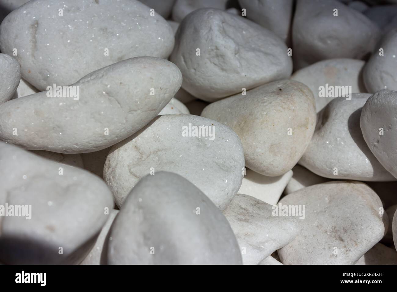 Decorative stones in the rays of sunlight Stock Photo - Alamy