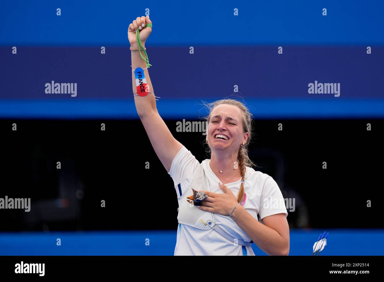 France's Lisa Barbelin celebrates after winning the women's archery ...