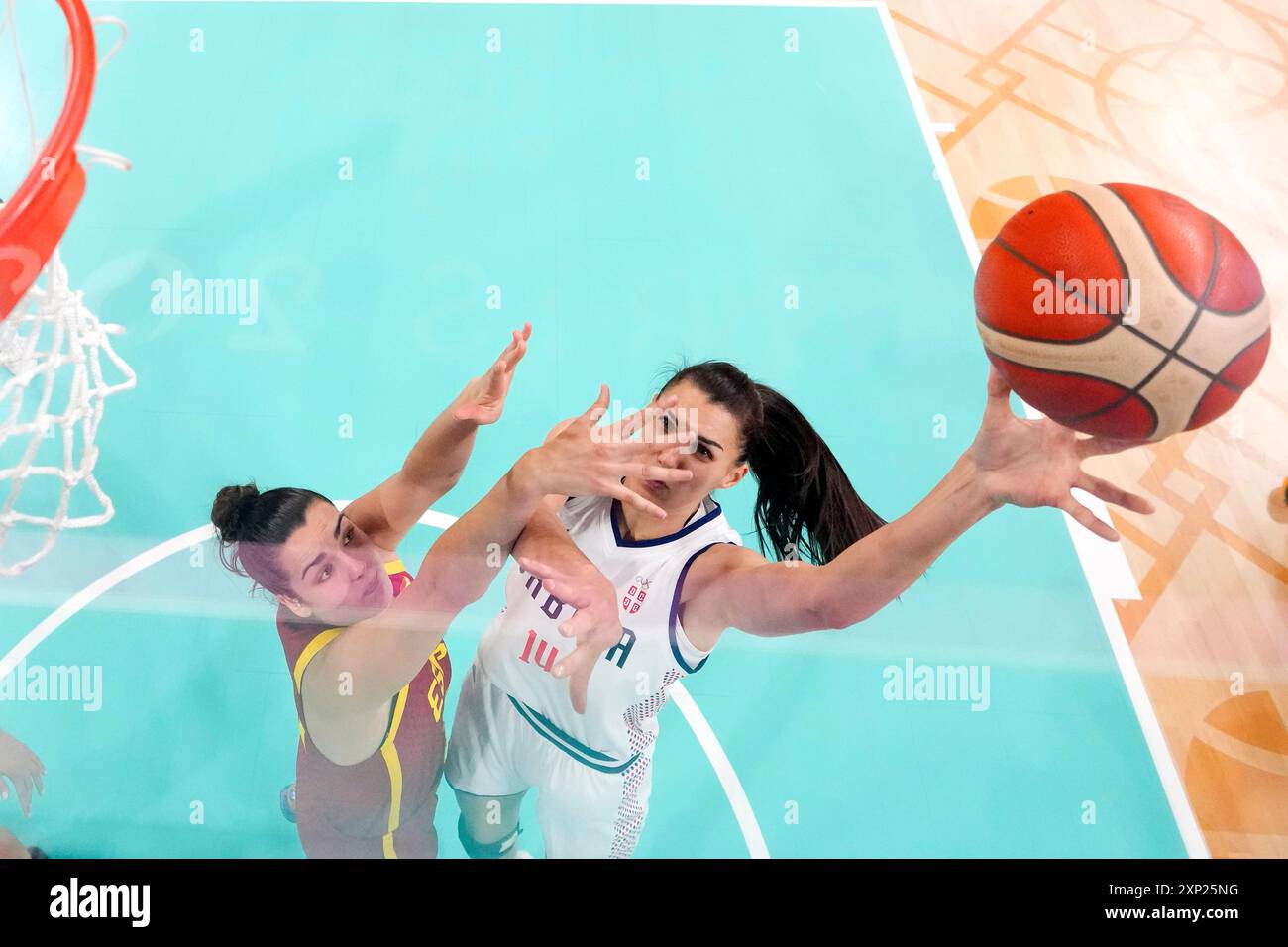 Serbia's Dragana Stankovic,r right, shoots as Spain's Paula Ginzo ...