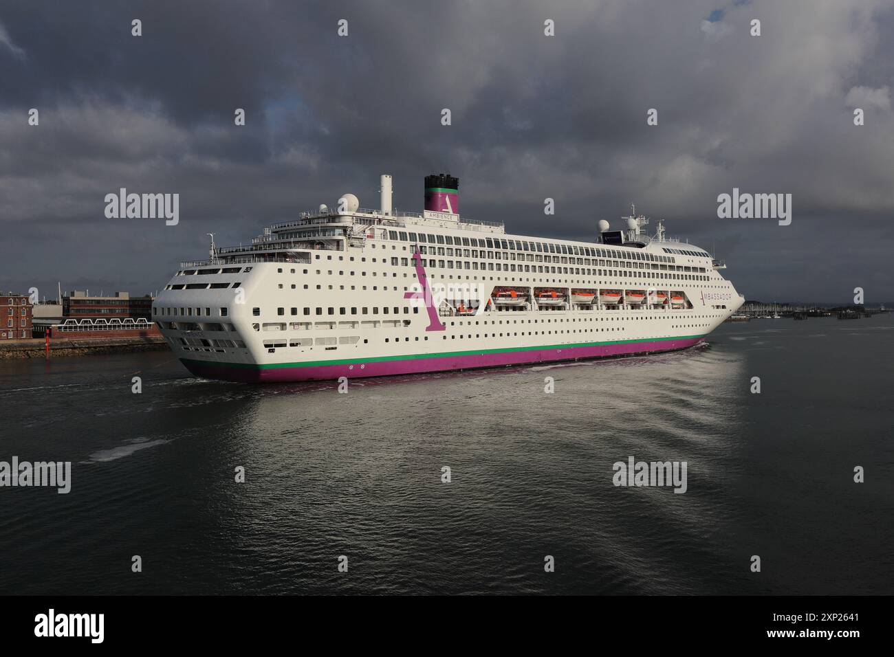 Early morning sunshine and grey skies greet the Ambassador Cruise Line ...