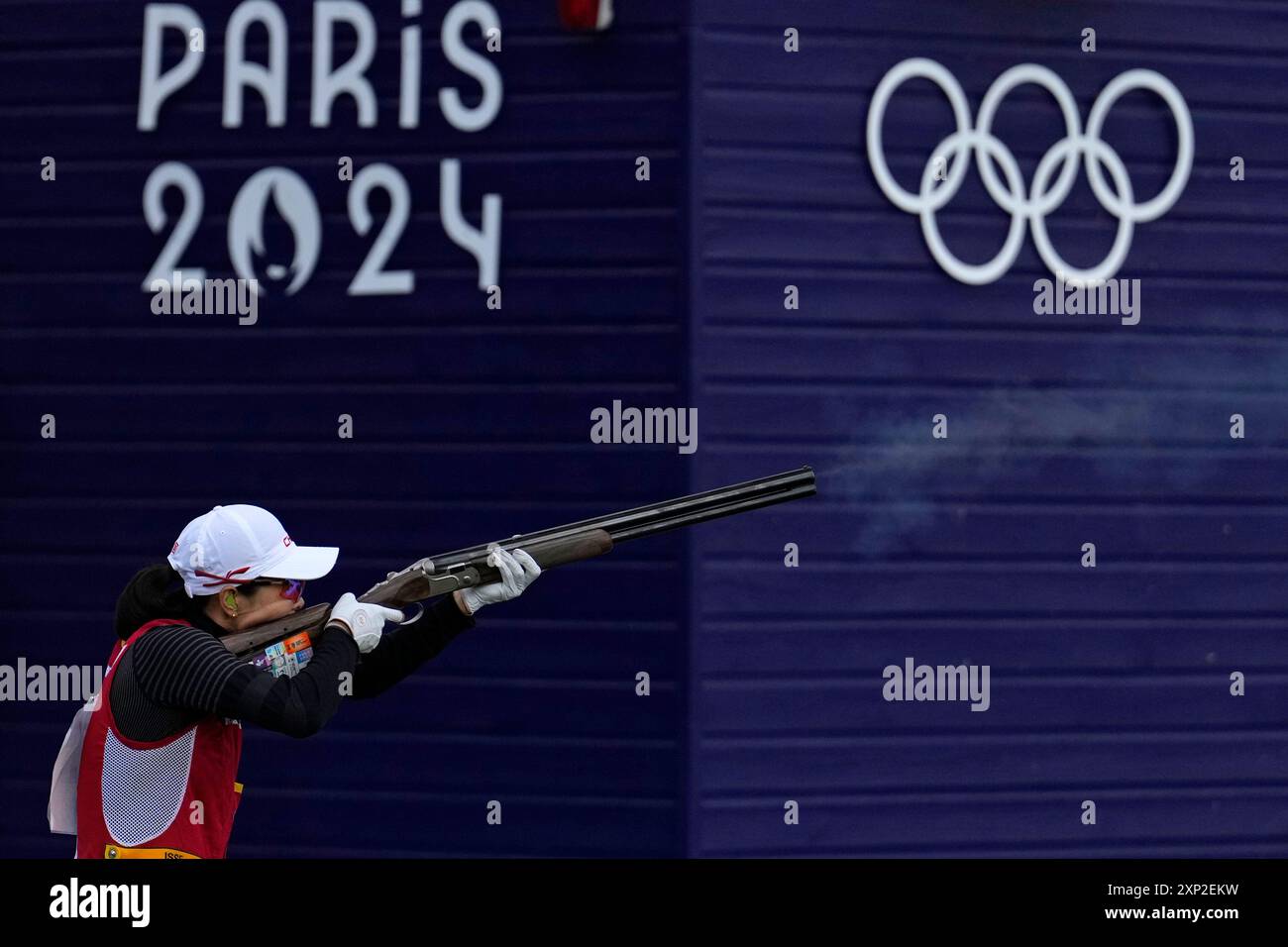 China's Wei Meng competes in the Skeet women's qualification round at ...